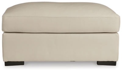 Treasure Trove Leather Ottoman | Ashley