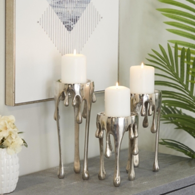 Click here for CosmoLiving by Cosmopolitan Decorative Melting Dri... prices