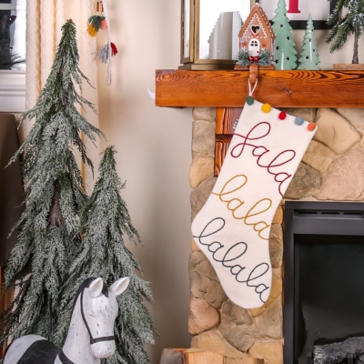 Click here for HGTV Home Collection Fa La La Stocking  White prices