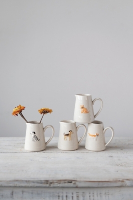 Click here for Storied Home Embossed Cat and Dog Design Pitchers... prices