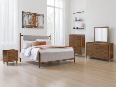Click here for Lyncott Queen Upholstered Panel Bed  Brown prices