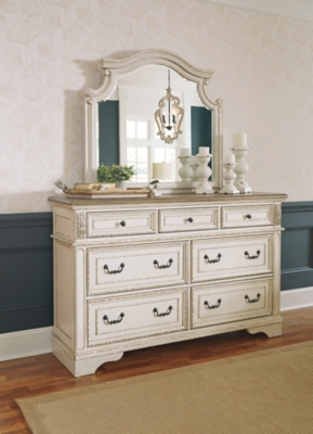 Click here for Realyn King Upholstered Panel Bed with Mirrored Dr... prices