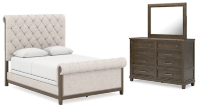 Click here for Hillcott Queen Upholstered Bed with Mirrored Dress... prices