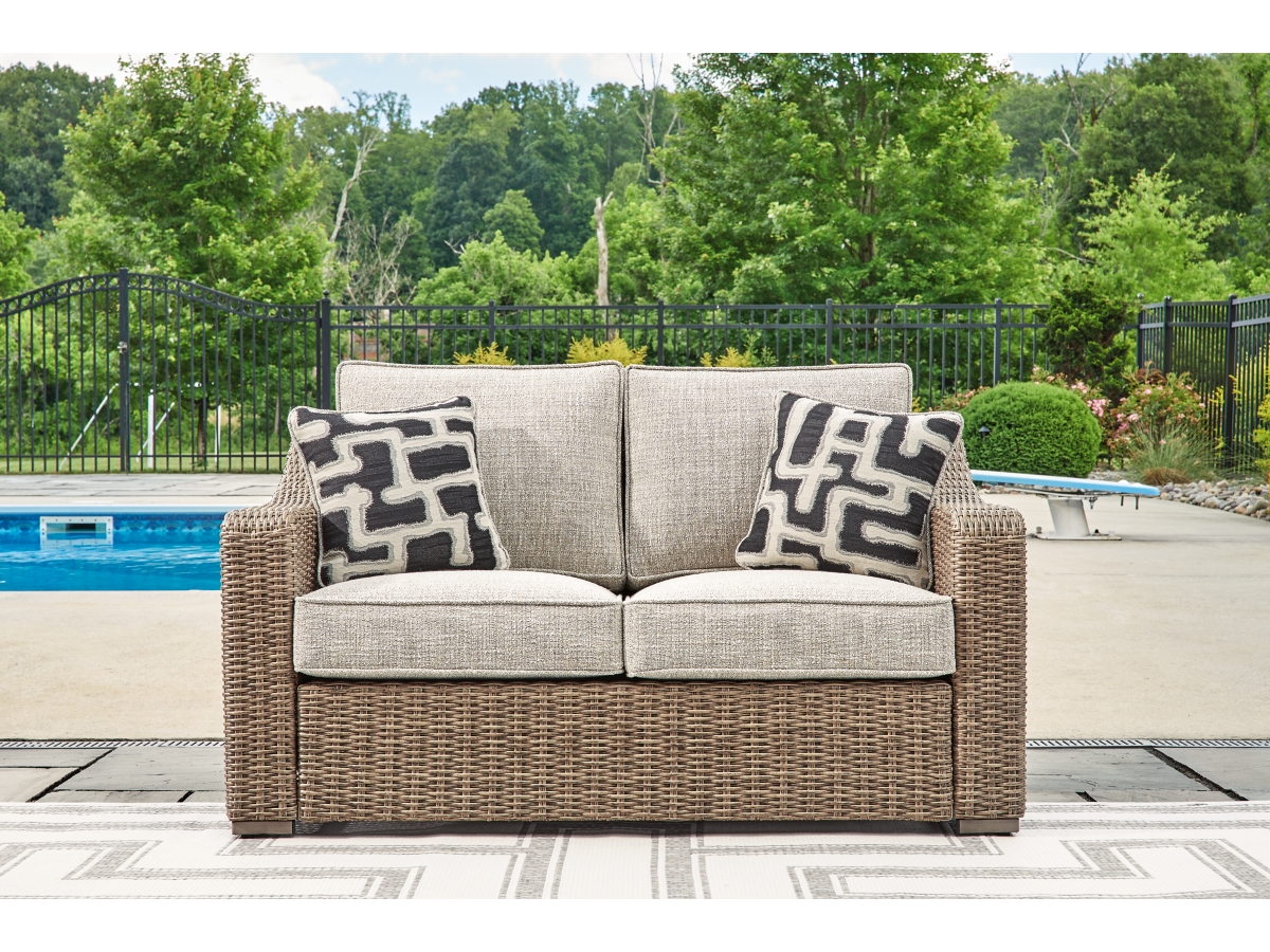 Beachcroft Outdoor Loveseat with Cushion Ashley