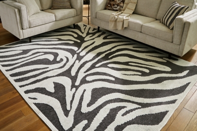 Click here for Thomwith Washable 710 x 101 Rug  Black/Ivory prices
