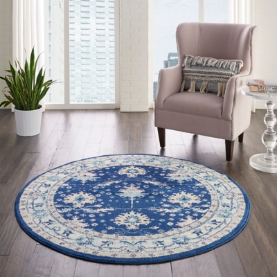 Click here for Nourison Tranquil Navy Blue 5 Round Bordered Orien... prices