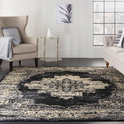Click here for Nourison Grafix 710 x 910 Black Vintage Indoor Rug prices