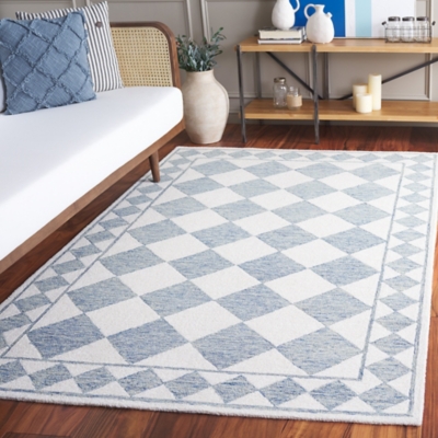 Click here for Safavieh Ebony 8 x 10 Area Rug  Blue/Ivory prices