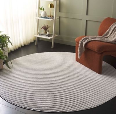 Click here for Safavieh Selena 6 7 x 6 7 Round Area Rug  Ivory prices