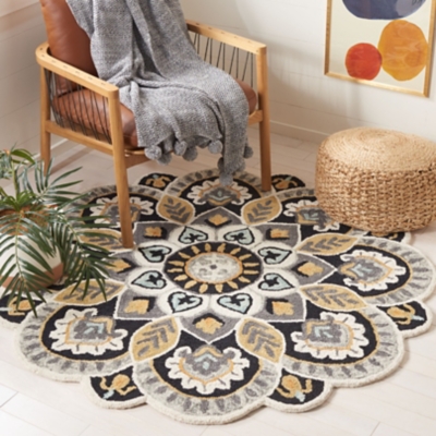 Click here for Safavieh Novelty Collection Urtza 12 x 12 Round Ru... prices